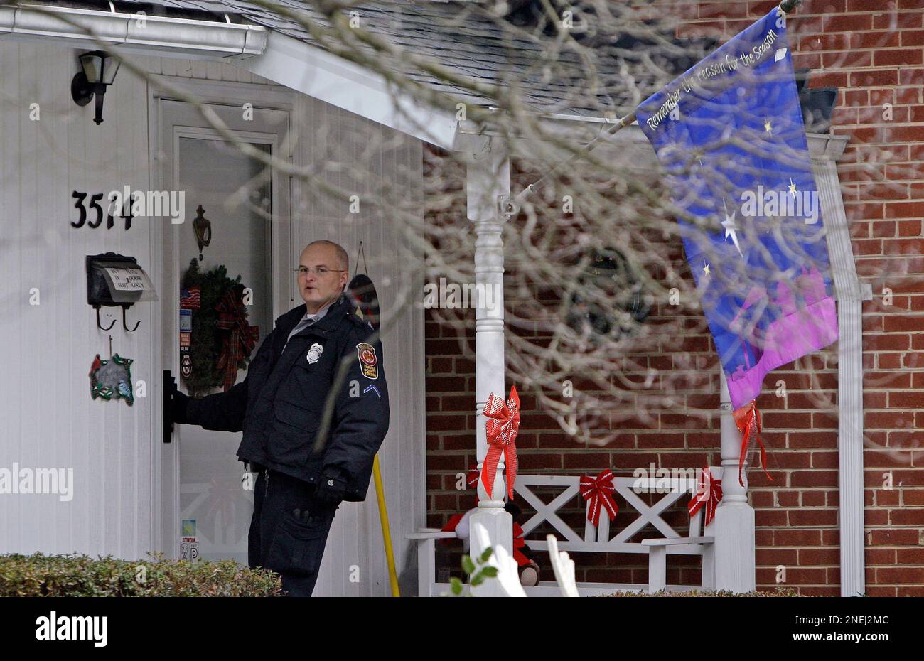 A Fairfax County police officer arrives at the home of Ruth and Claude ...