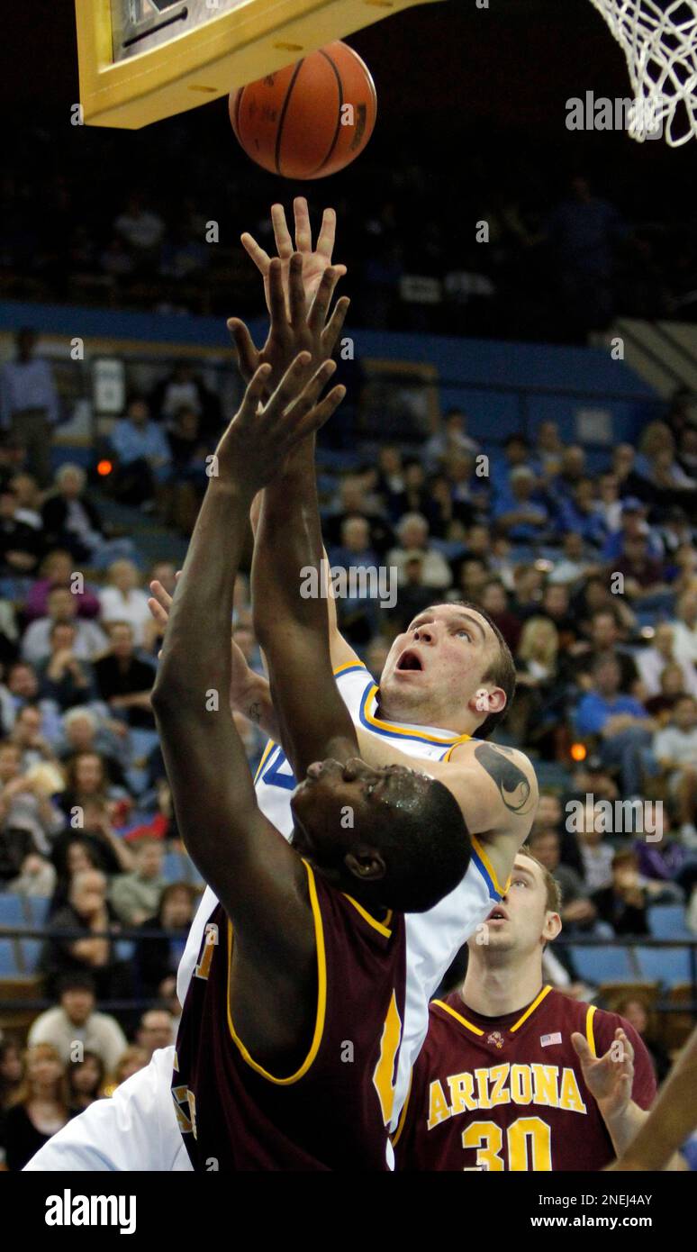 UCLA's Reeves Nelson puts up a shot as Arizona State's Eric Boateng ...