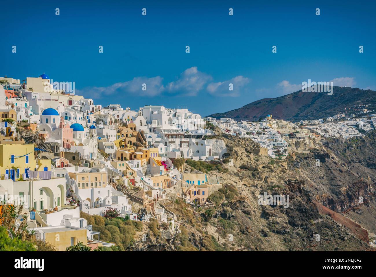The picturesque village of Oia perched on the Santorini caldera Stock ...