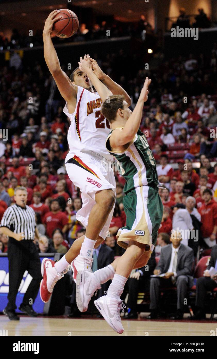 Maryland's Jordan Williams, left, goes to the basket against William ...