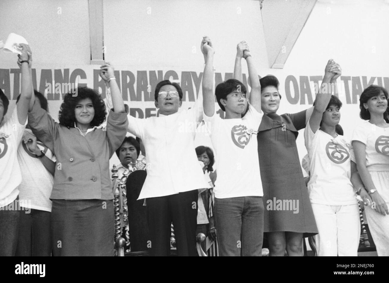 Philippine President Ferdinand E. Marcos (2nd from left), his wife ...
