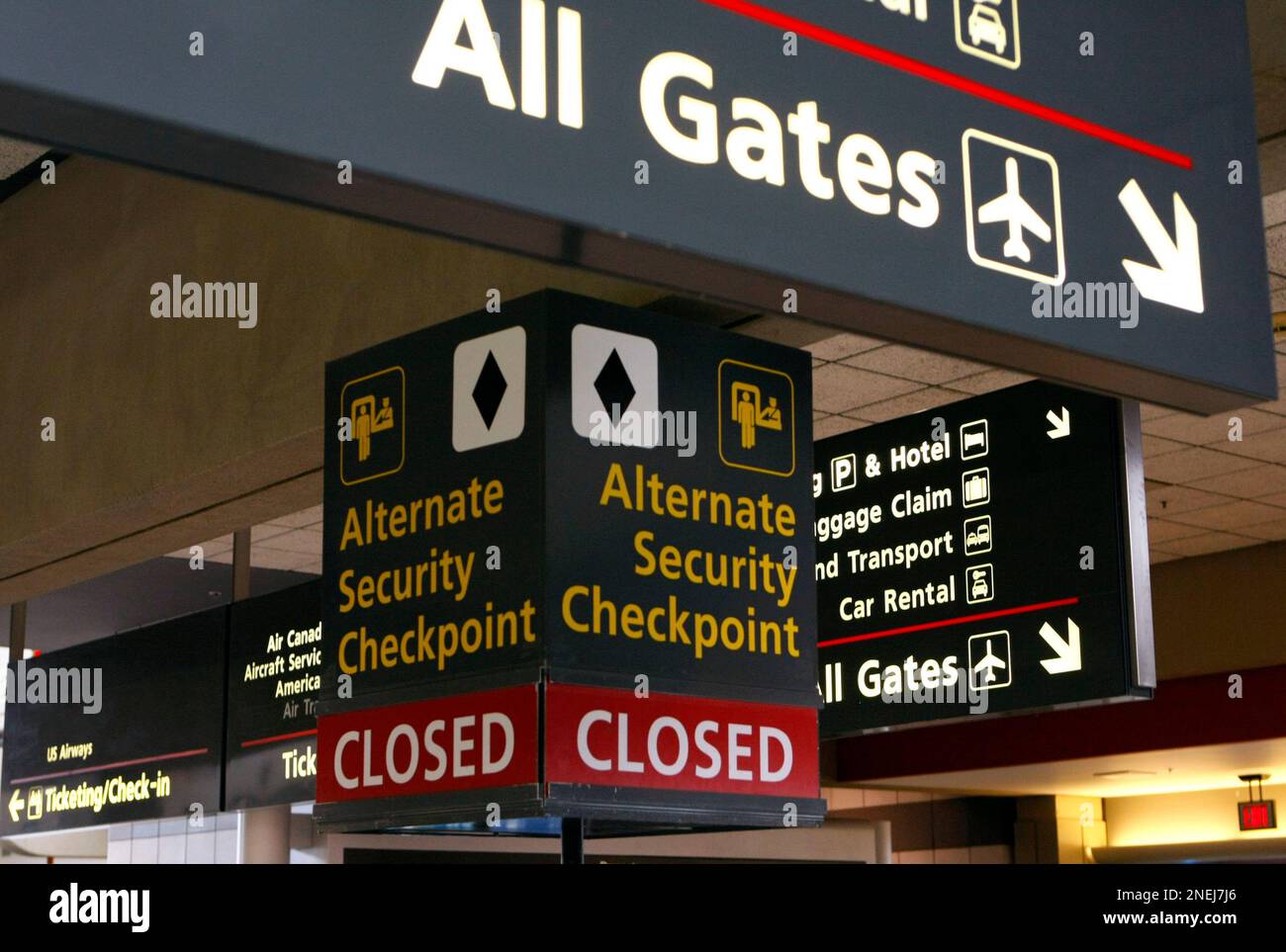 Direction signs for gates and the security checkpoints at the ...