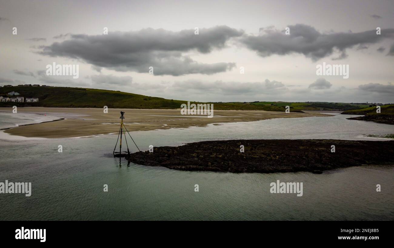 Sea silt, sandy beach on a cloudy summer day. Low tide, body of water ...