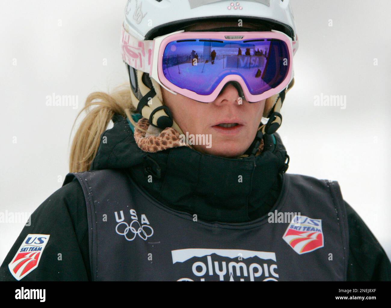 Michelle Roark from Denver, Colo. looks down the moguls course during ...