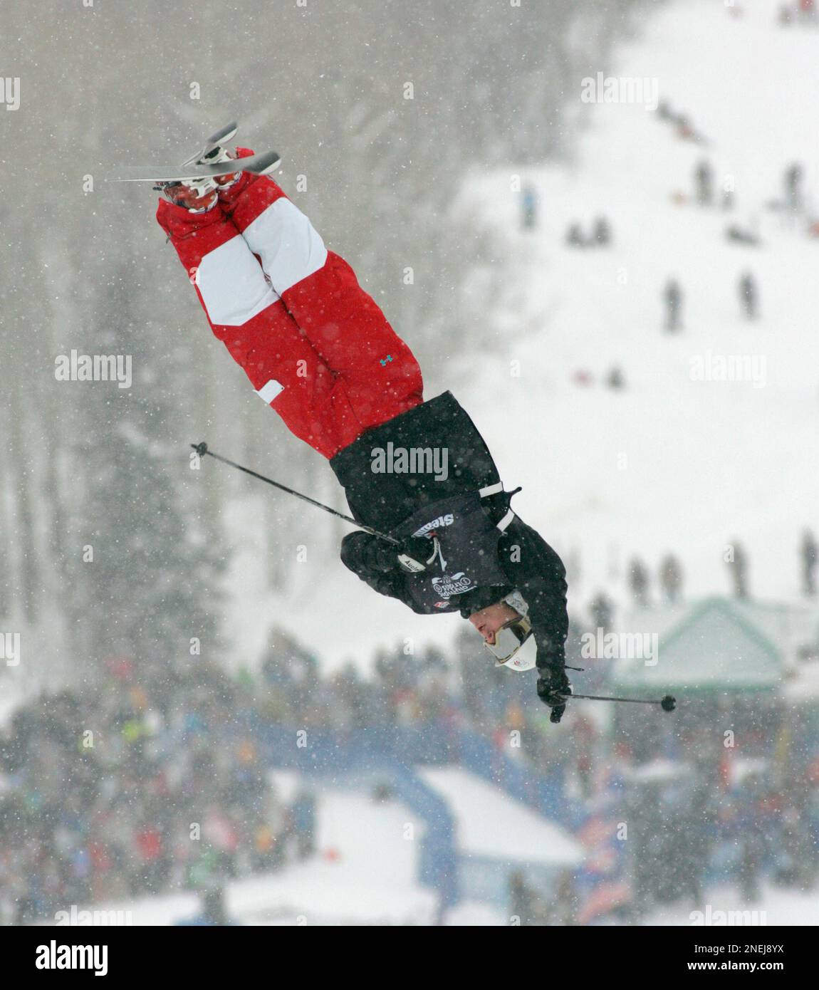 Bryon Wilson from Butte, Mont. takes air with his skis over the moguls ...
