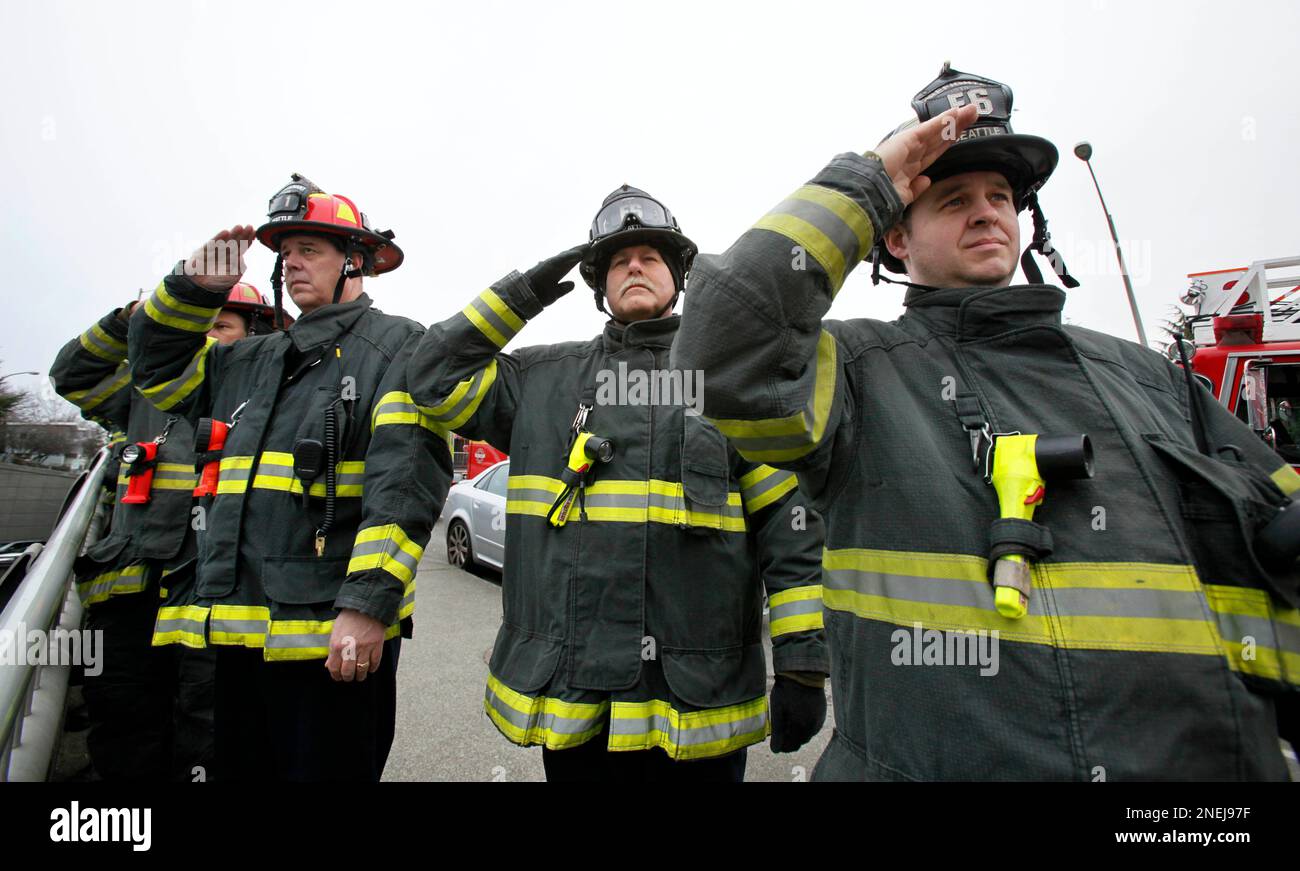 Seattle firefighters, from right, Daryl Whitley, William Smith Jr. and ...