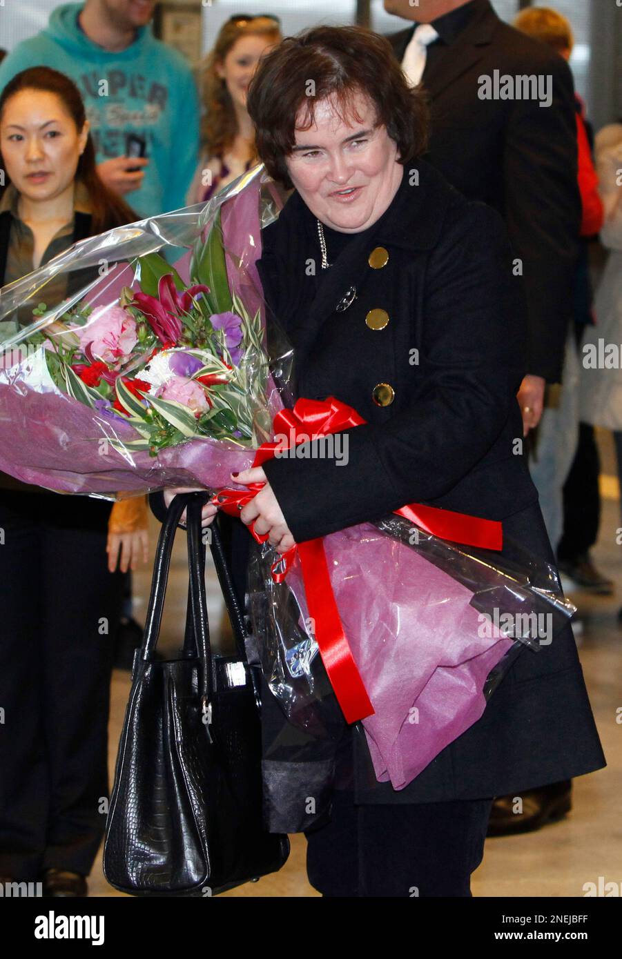 British singer Susan Boyle poses for photographers upon arriving at ...