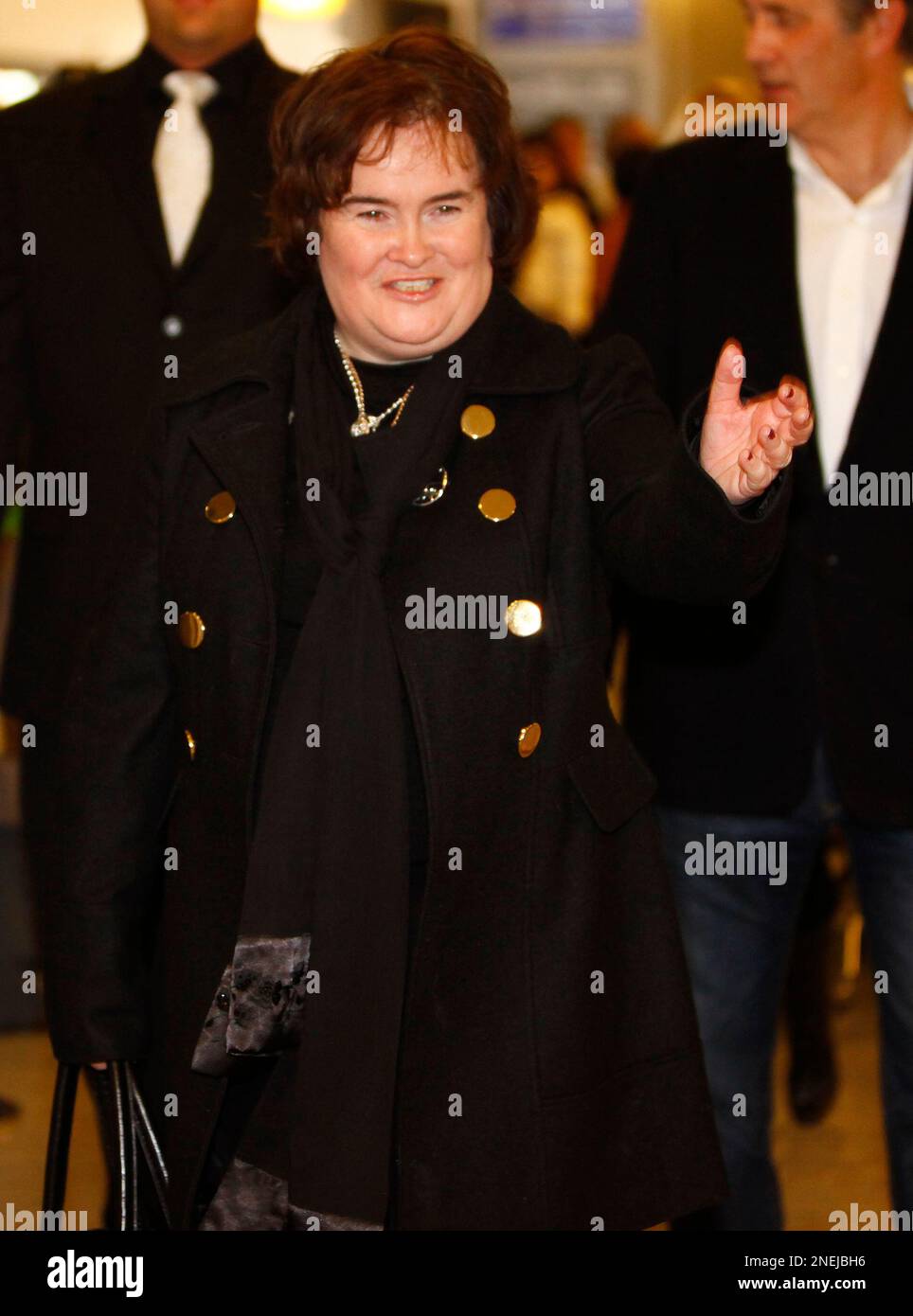 British singer Susan Boyle greets fans upon arriving at Narita ...