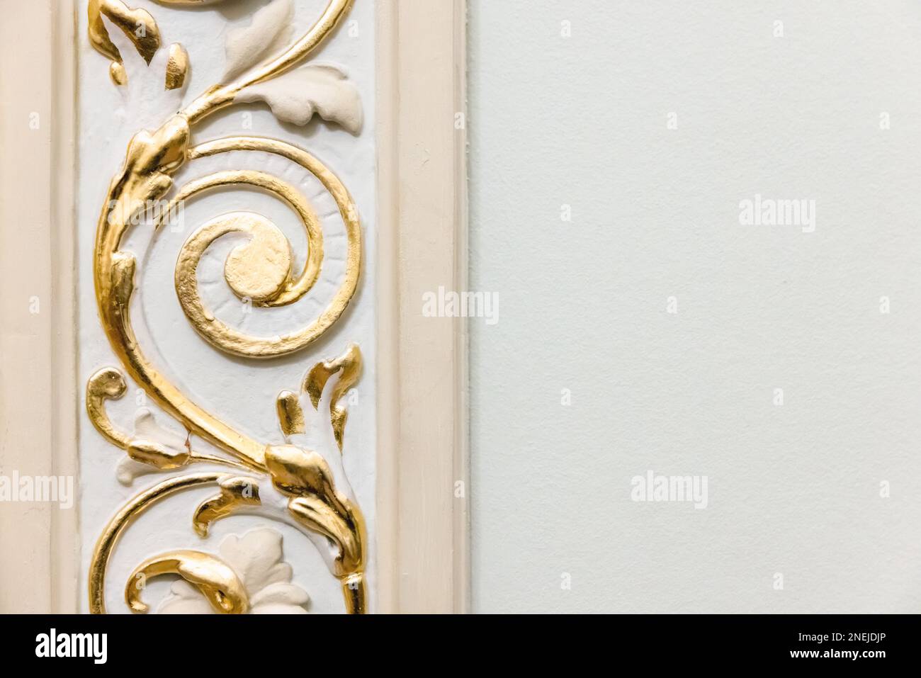 Classic luxury interior details, white and golden elements of gypsum ...
