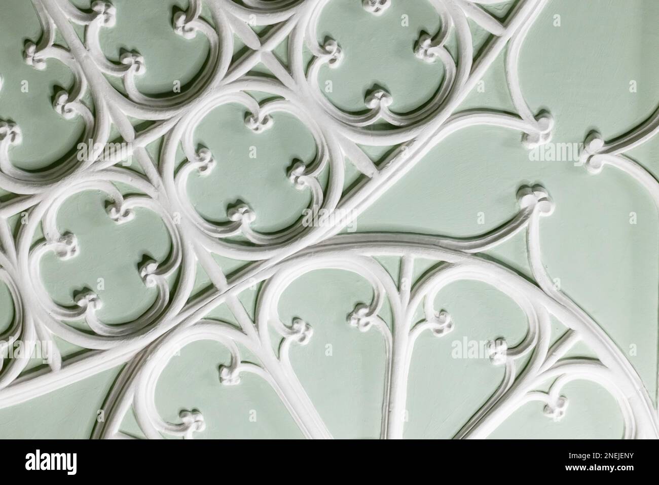 White gypsum bas-relief ceiling design details in Gothic style, classic ...