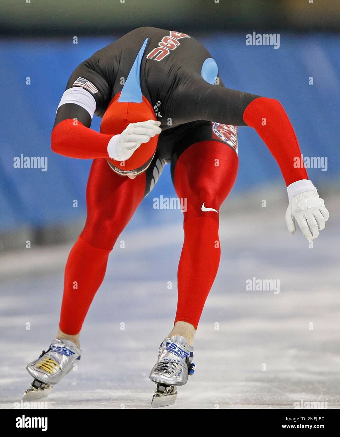 United States' Mitchell Whitmore stretches for the finish line for a ...