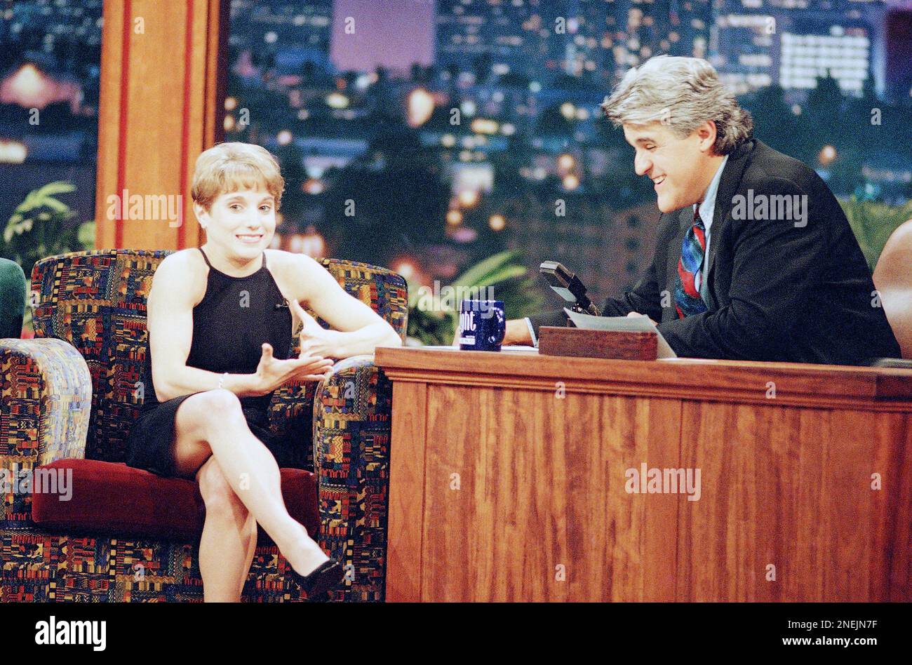 U.S. gold medal gymnast Kerri Strug jokes with talk show host Jay Leno ...