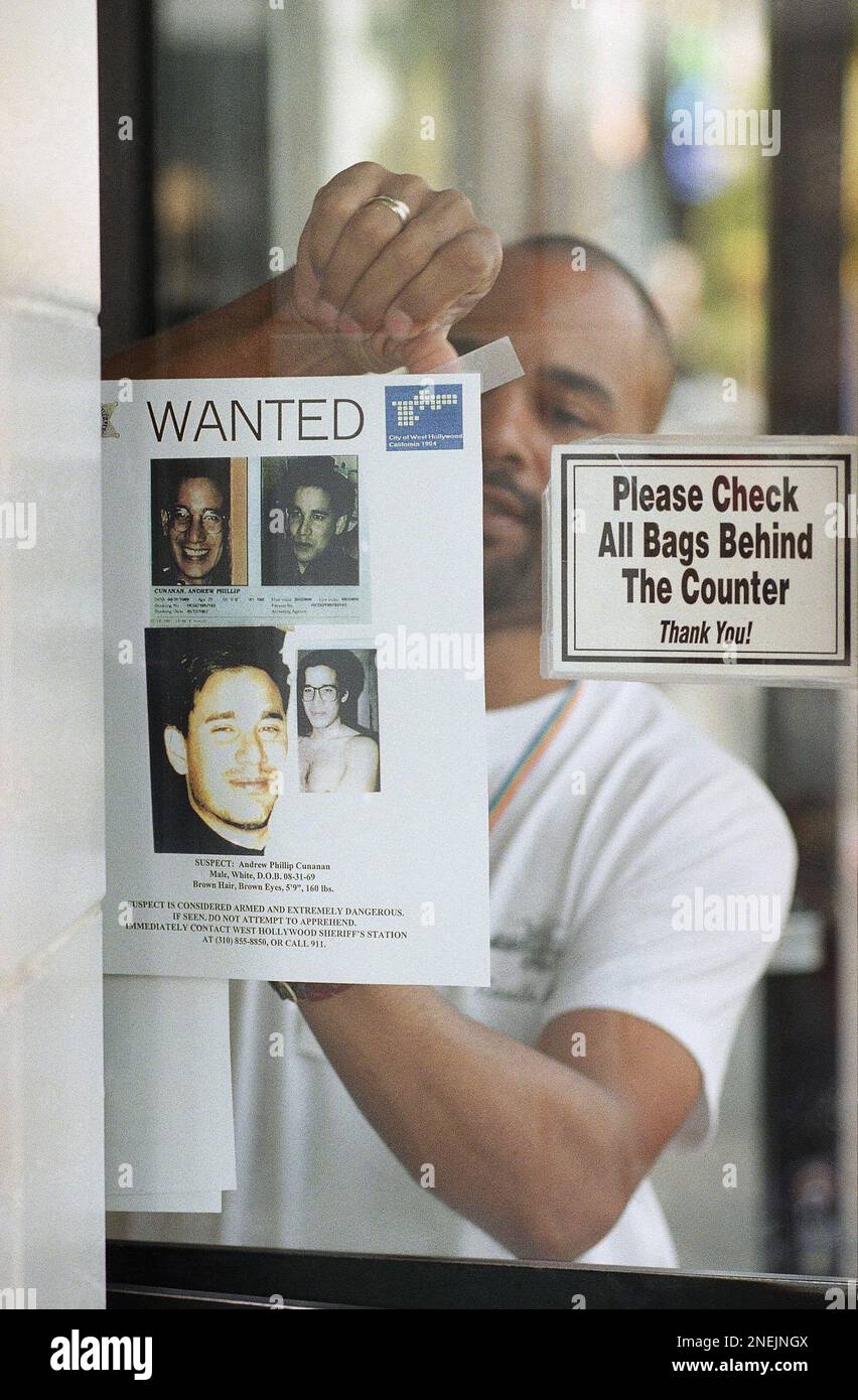 Mark Haile a store clerk in West Hollywood, Calif. tapes a copy of a ...
