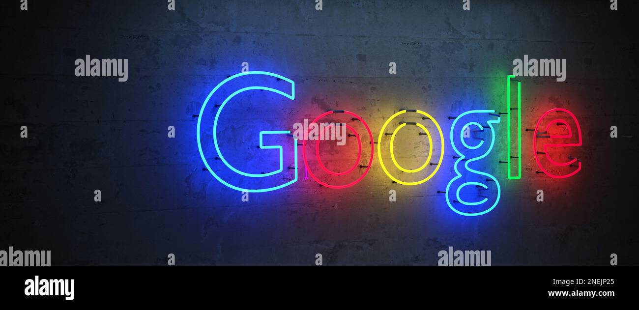 The text "Google" in differently colored neon tubes on a concrete wall ...