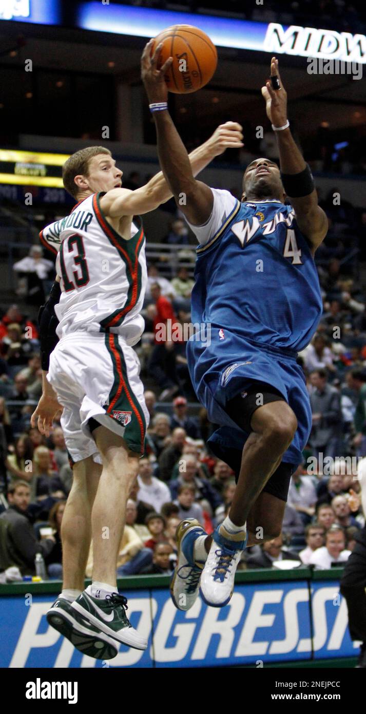 Washington Wizards' Antawn Jamison (4) is fouled by Milwaukee Bucks ...