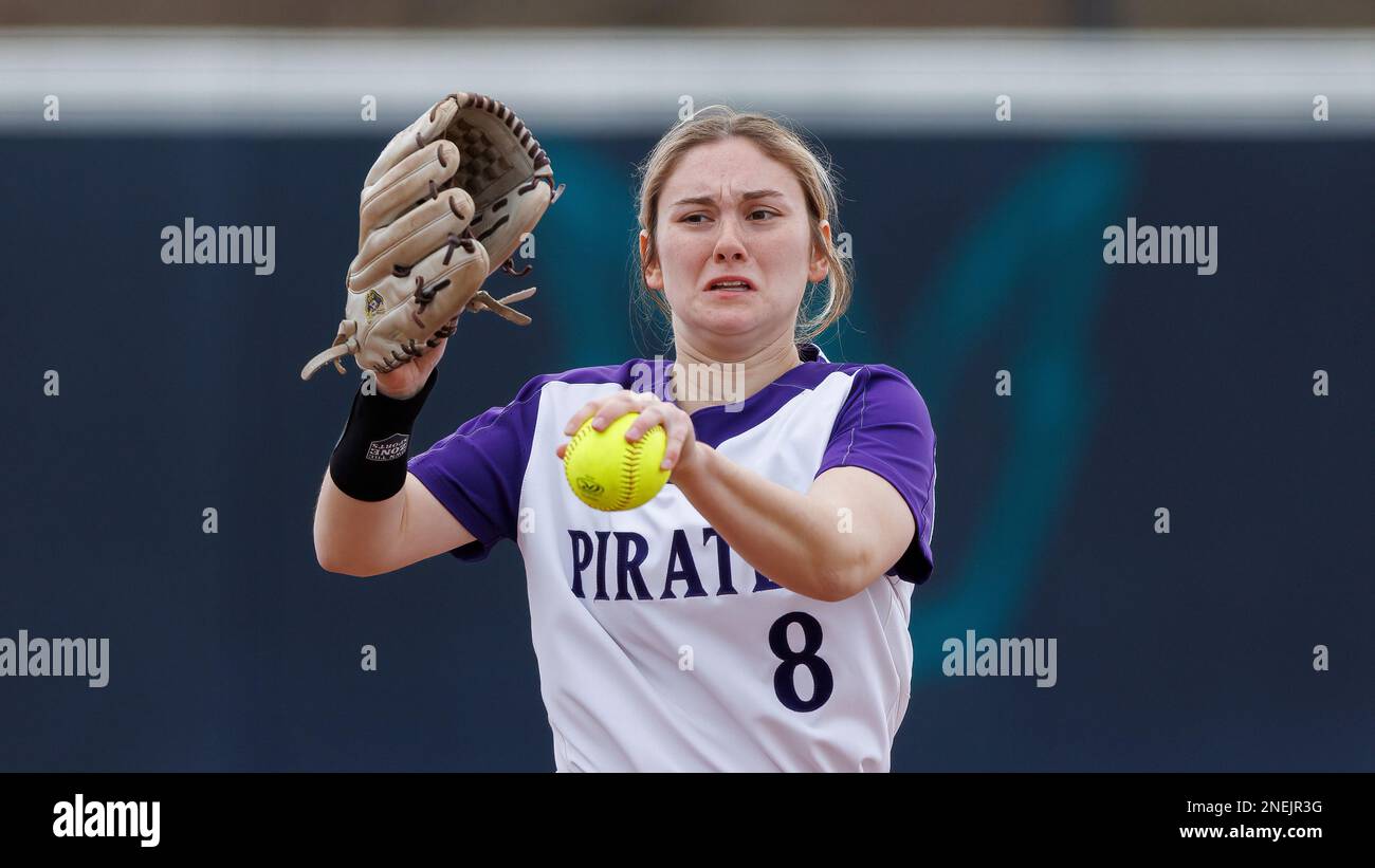 East Carolina's Jordan Hatch (8) pitches during an NCAA softball game ...