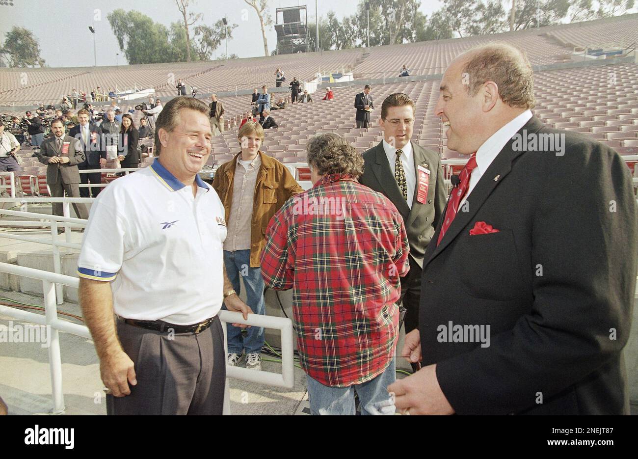 UCLA head coach Bob Toledo, left, shares a laugh with Wisconsin head ...