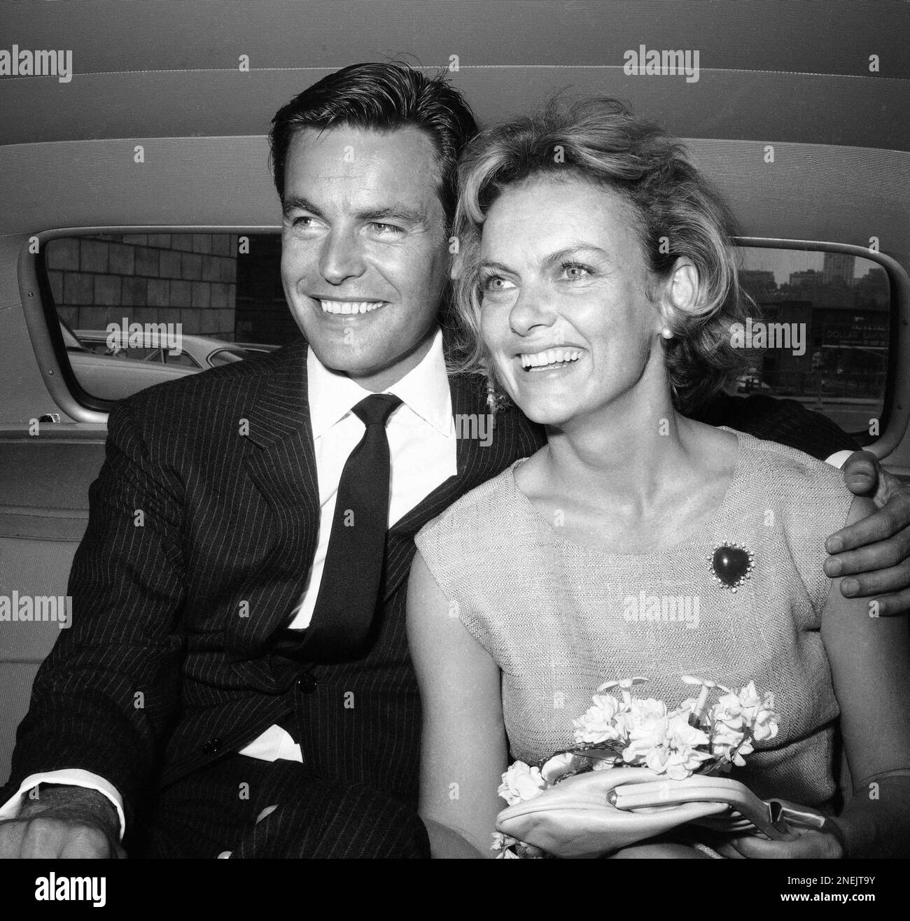 Actress Marion Marhsall, 34, and her husband, actor Robert Wagner, 33, smile as they pose in New ...
