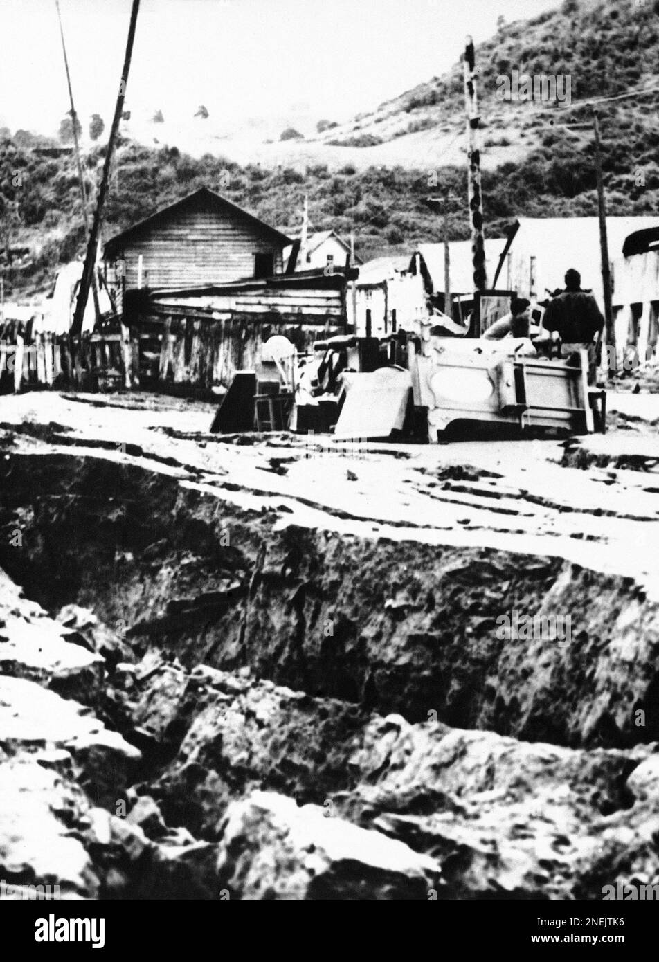 Earthquake left this wide crevice in street of Puerto Montt in southern ...