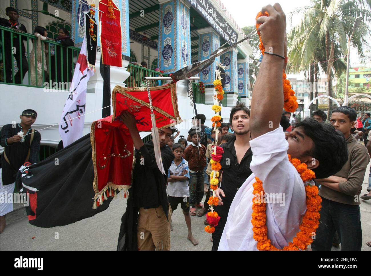Bangladeshi Shiite Muslims make preparations to observe the holy month ...