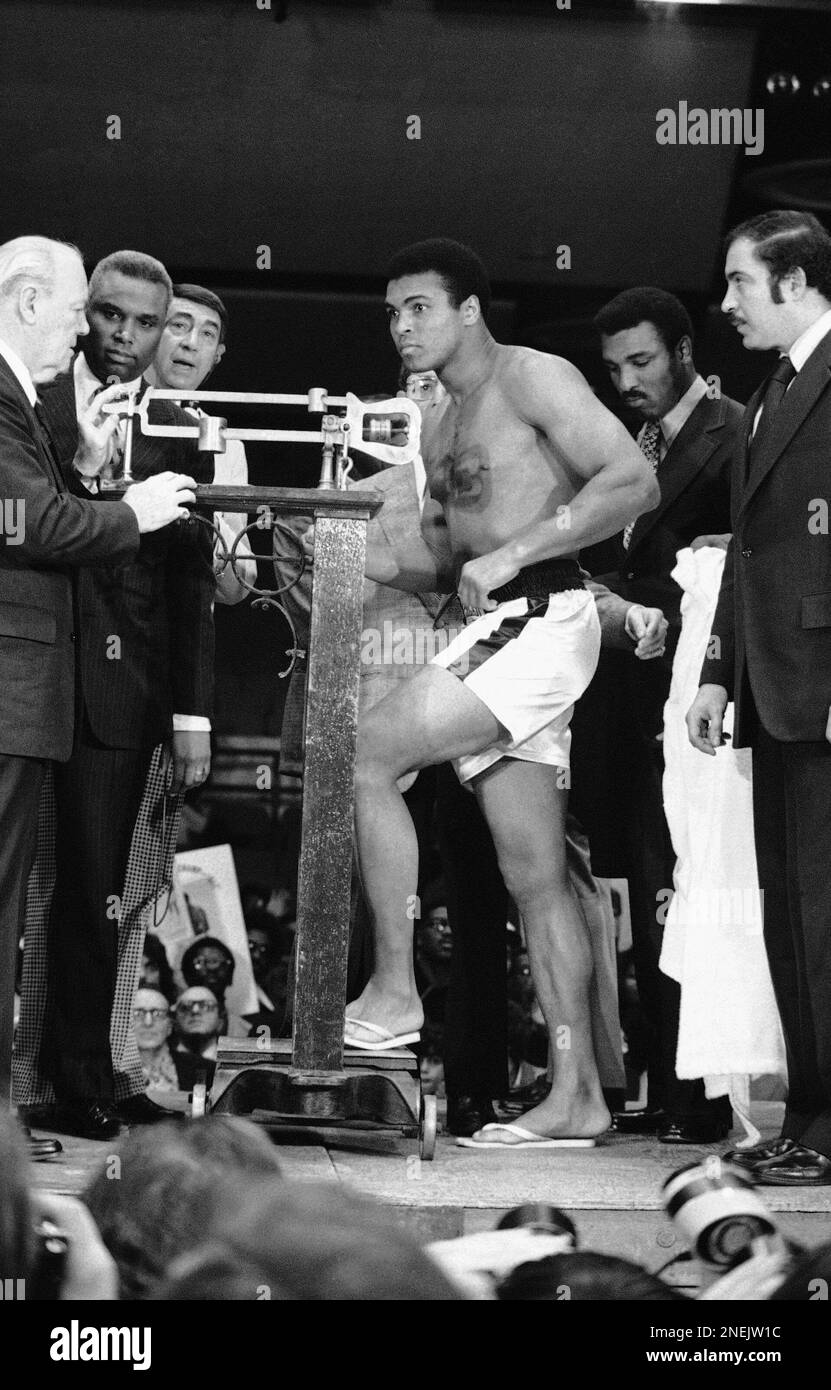 Muhammad Ali weighs in for his return fight with Joe Frazier, Jan. 28 ...