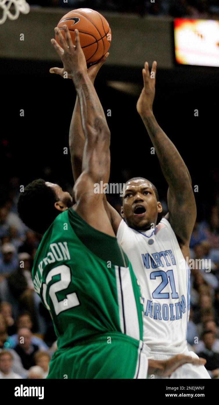 North Carolina forward Deon Thompson (21) shoots over Marshall forward ...