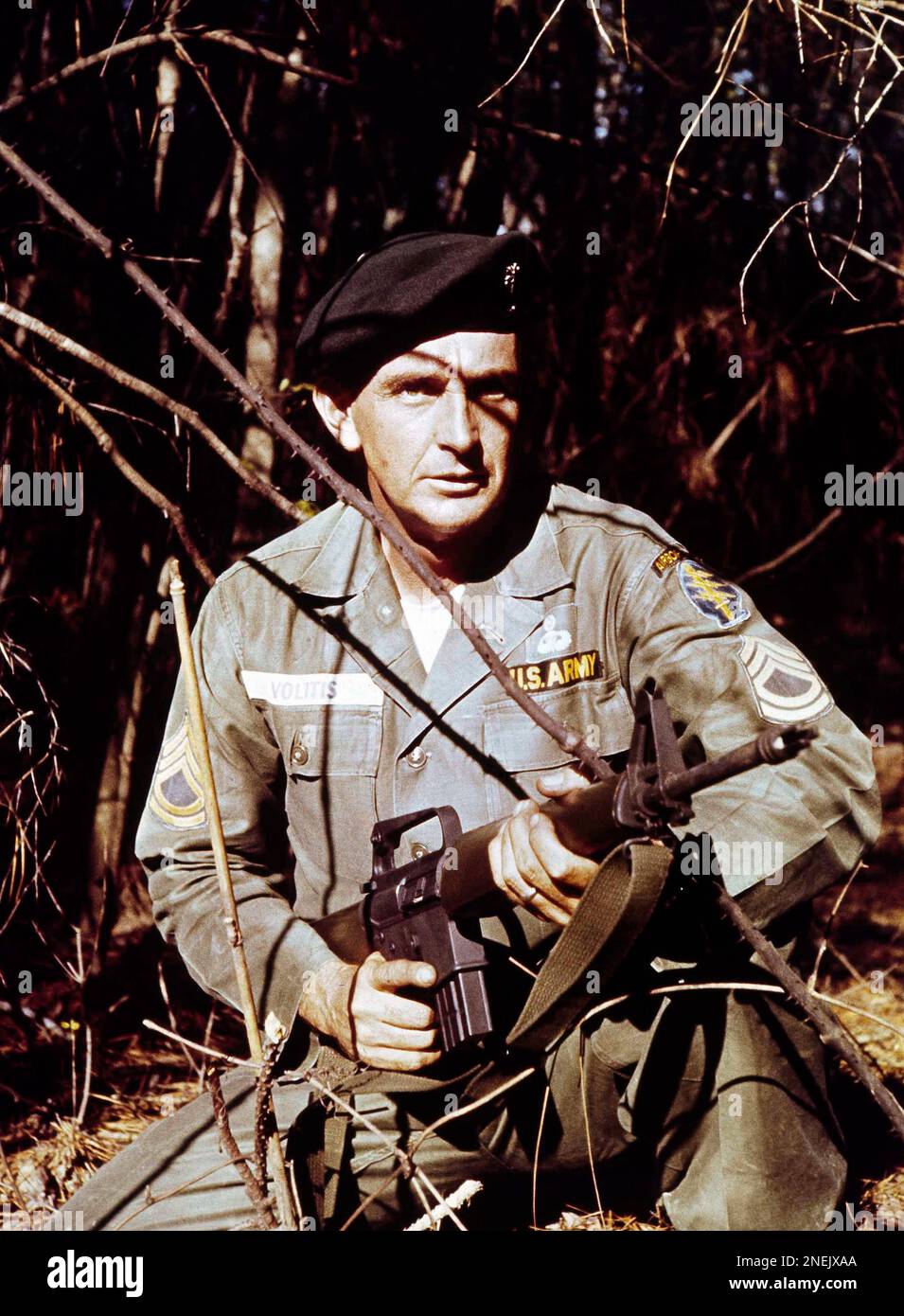 John B. Volitis, Co. A, 5th Special Forces, fires the AR-15 rifle in ...