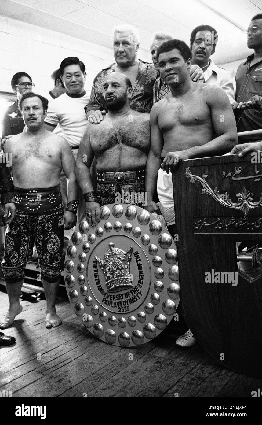 World heavyweight boxing champion Muhammad Ali is joined in this ...