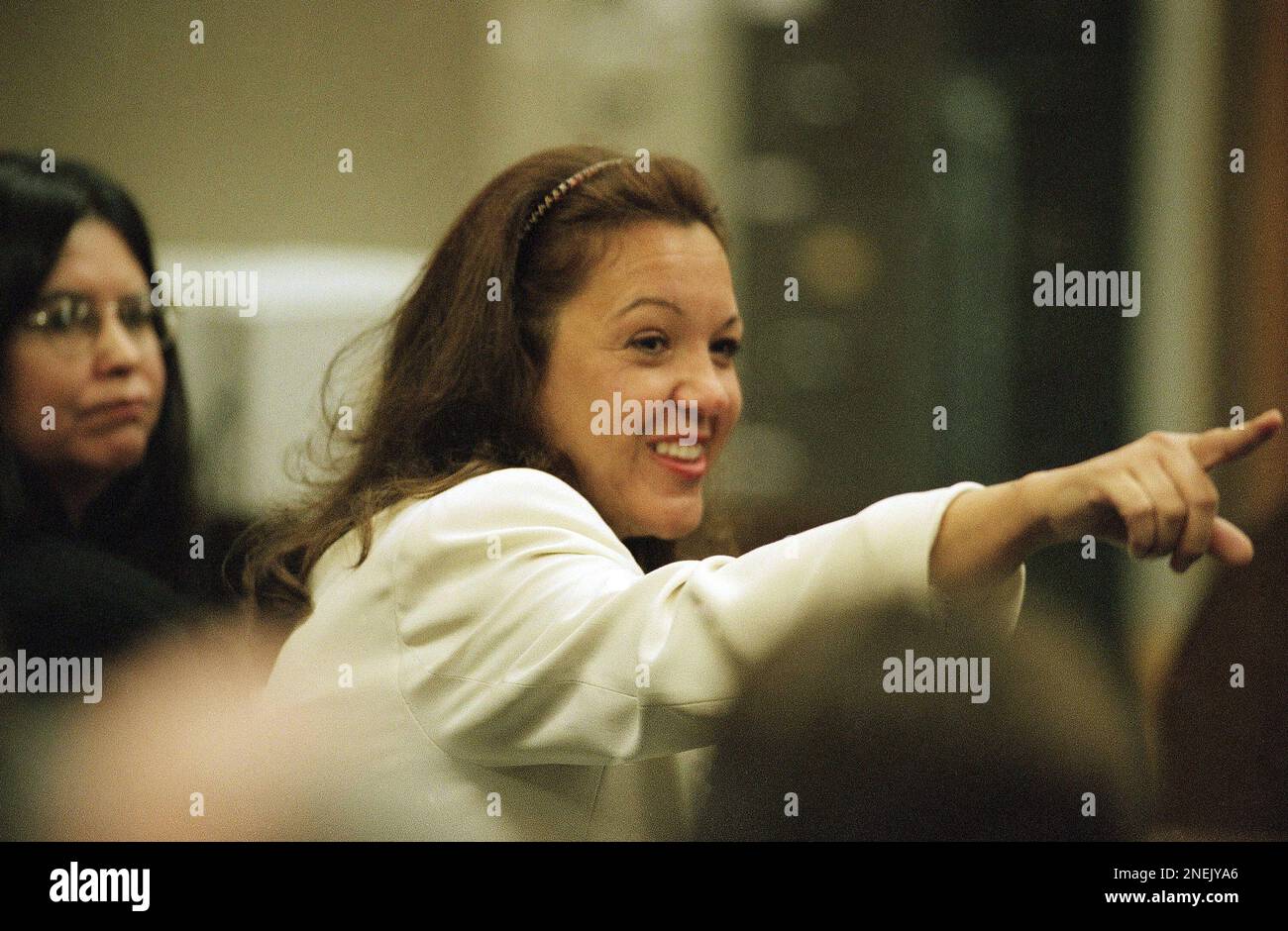 Whitewater figure Susan McDougal points to the jury following her ...