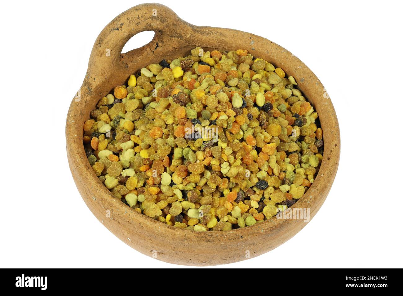 organic bee pollen in a handmade earthenware dish Stock Photo - Alamy