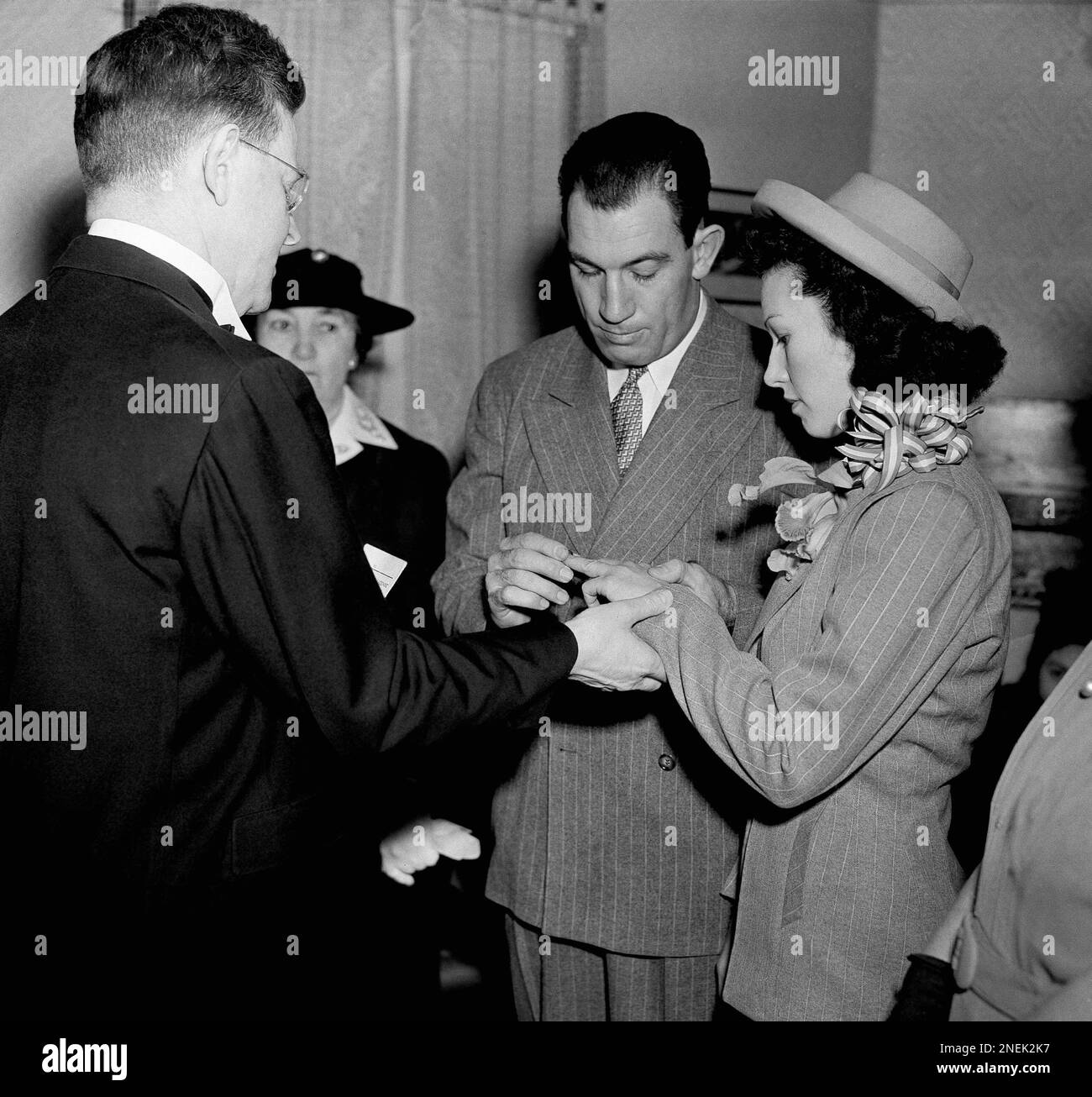 Clarence ?Ace? Parker, Brooklyn Dodgers pro football star, places the ...