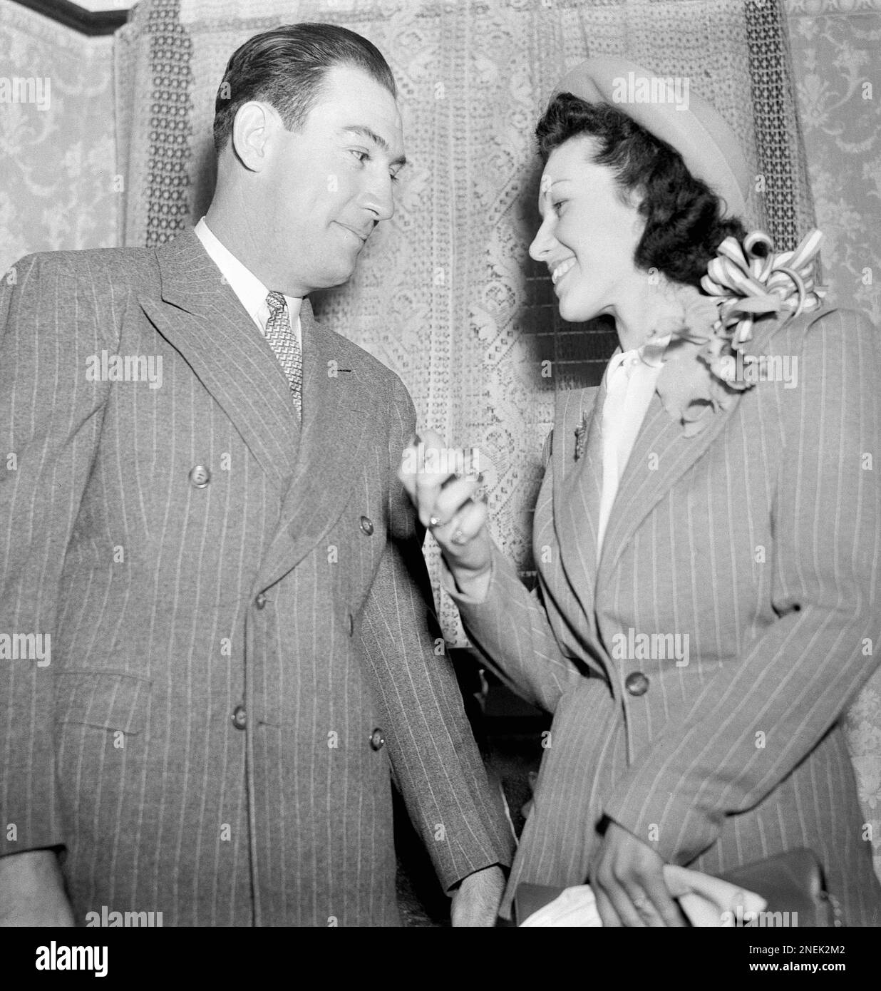 Clarence ?Ace? Parker, Brooklyn Dodgers pro football star, places the ...