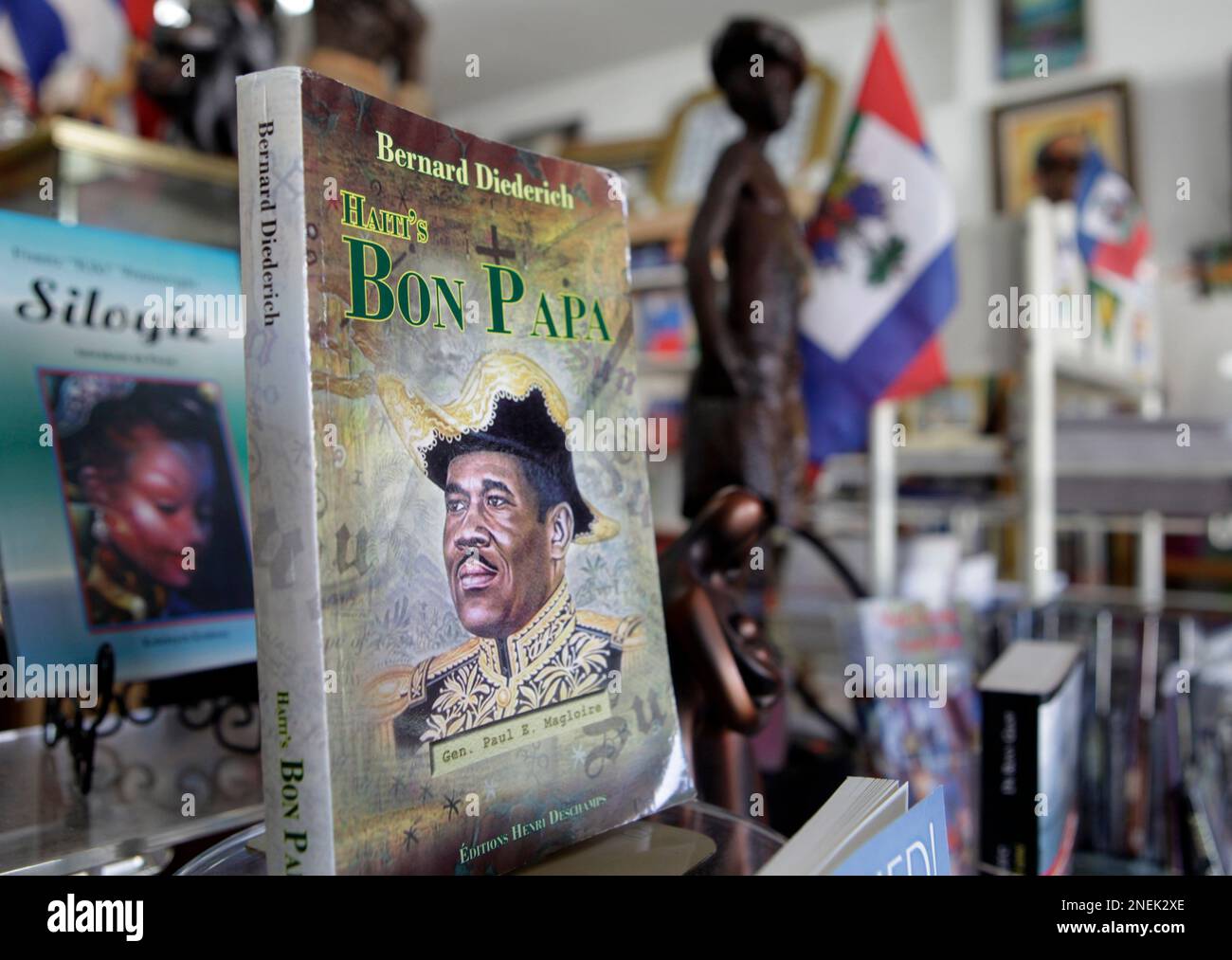 In this Saturday, Dec. 19, 2009 photo, a book about Haitian history is ...