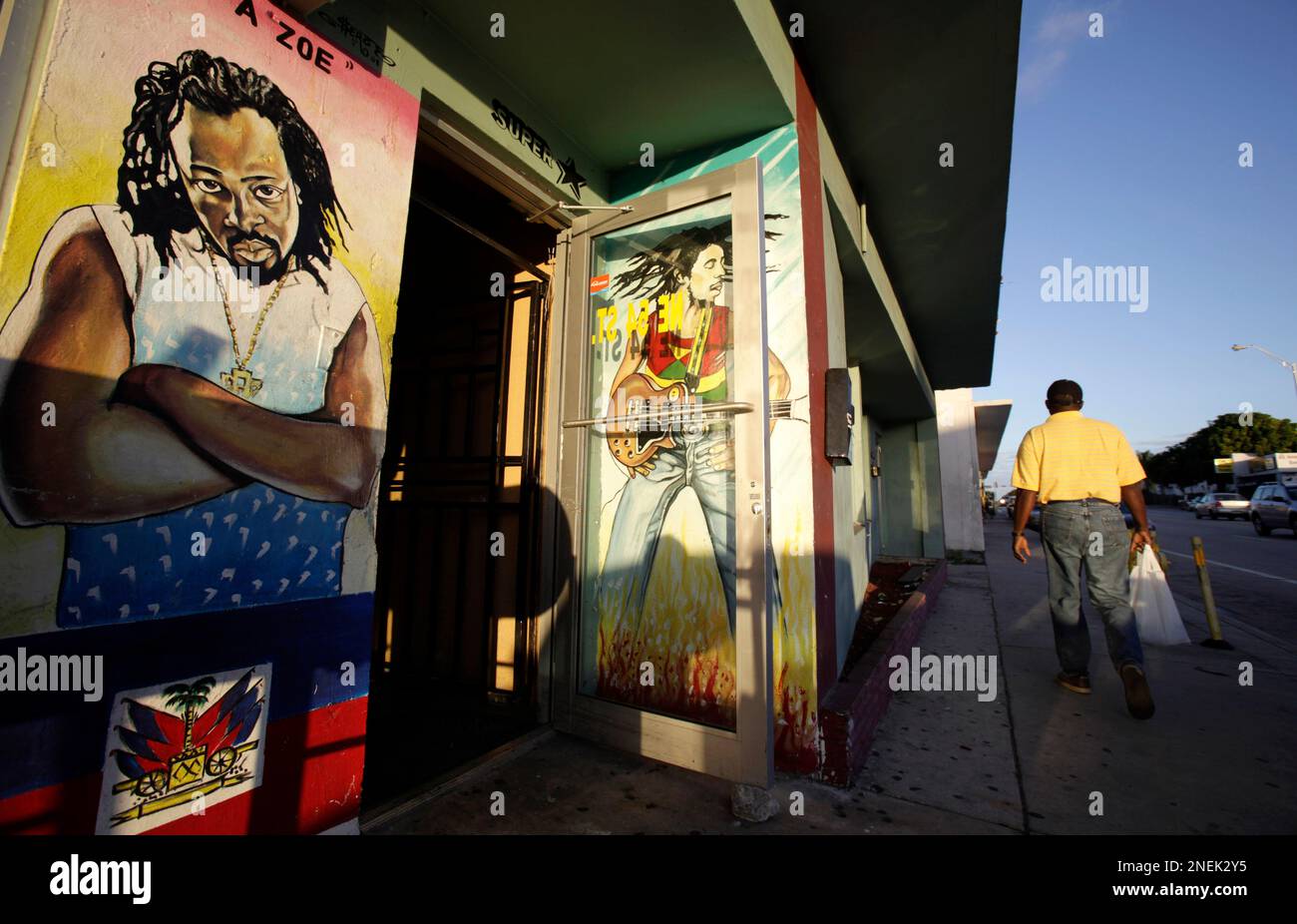 In this Tuesday, Dec. 14, 2009 photo, a mural by artist Serge Toussaint ...