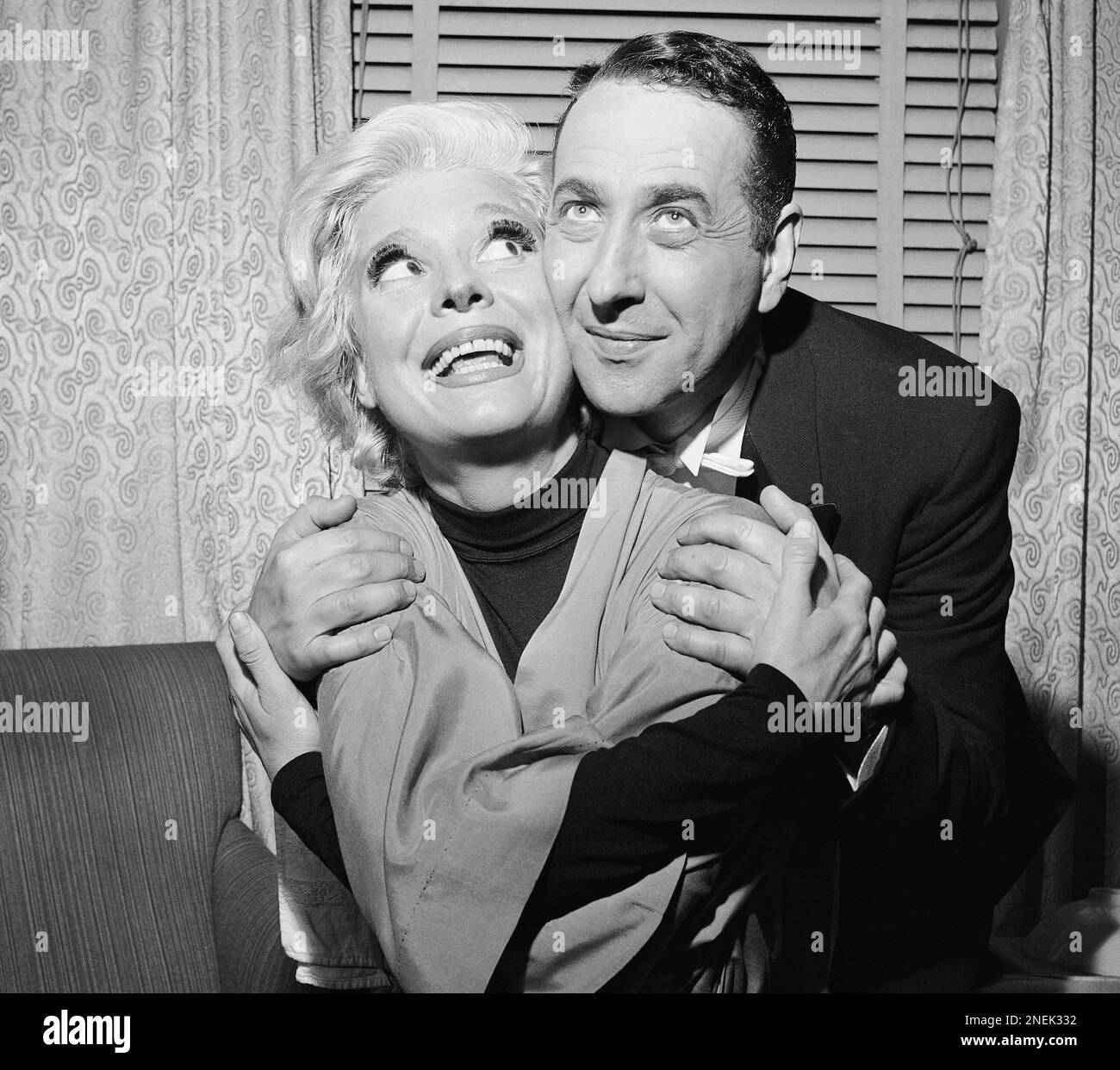 Carol Channing and Jules Munshin team up for photographer in dressing room pose backstage at the ...