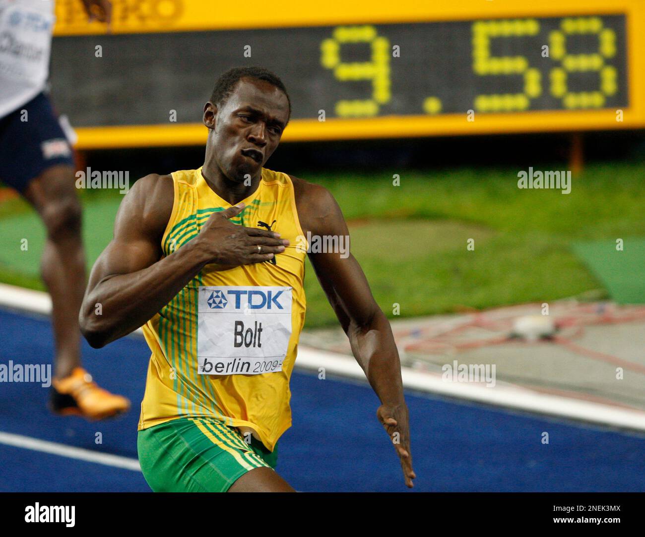 FILE - Jamaica's Usain Bolt celebrates setting a new Men's 100m World ...