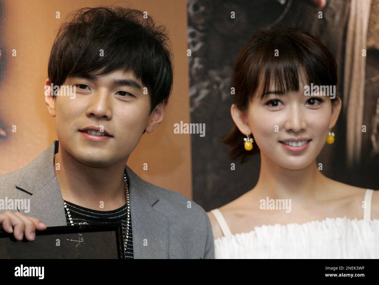 Taiwanese actor Jay Chou, left, and Taiwanese actress Lin Chiling pose ...