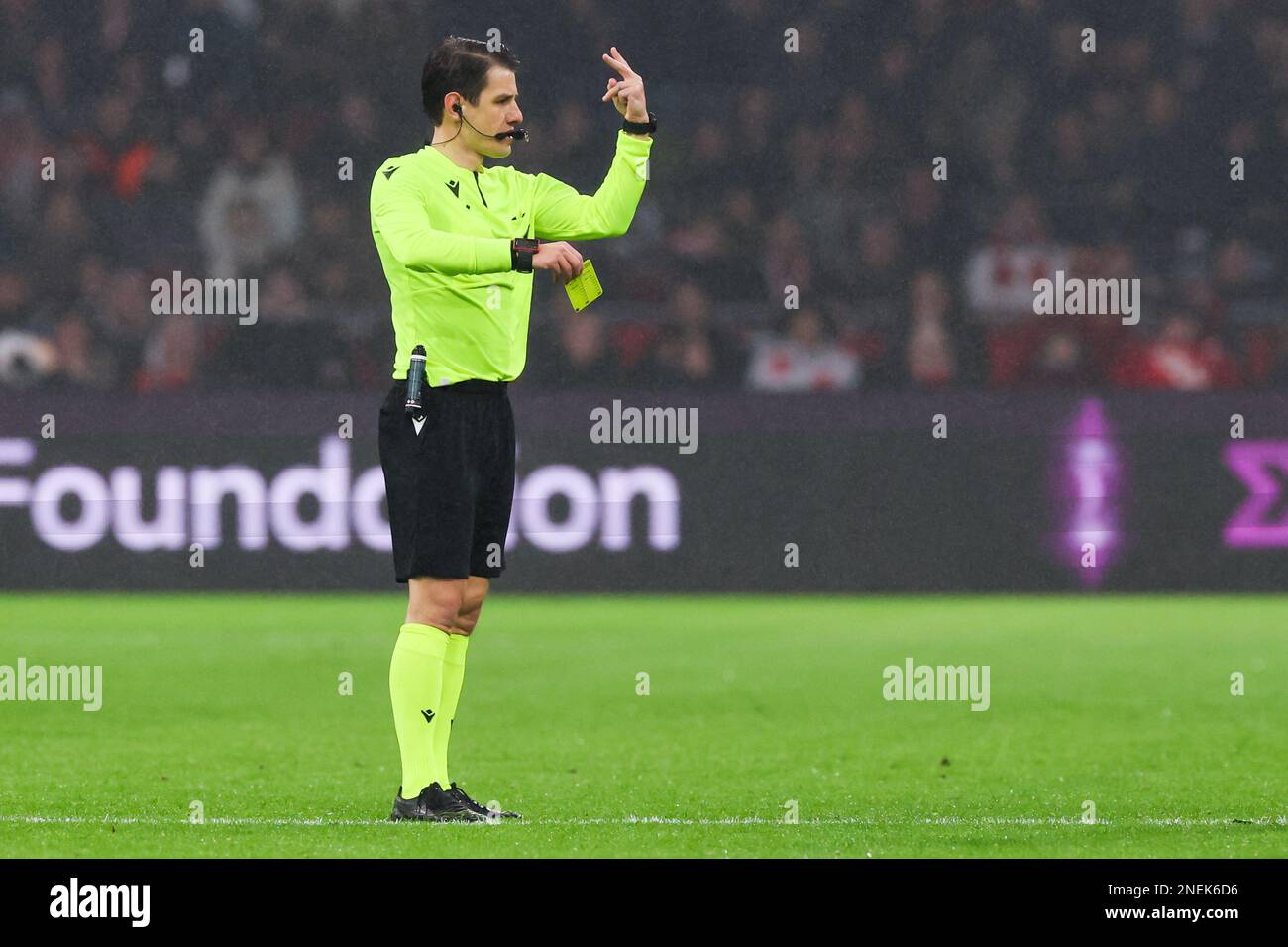 AMSTERDAM, NETHERLANDS - FEBRUARY 16: referee Halil Umut Meler TUR ...