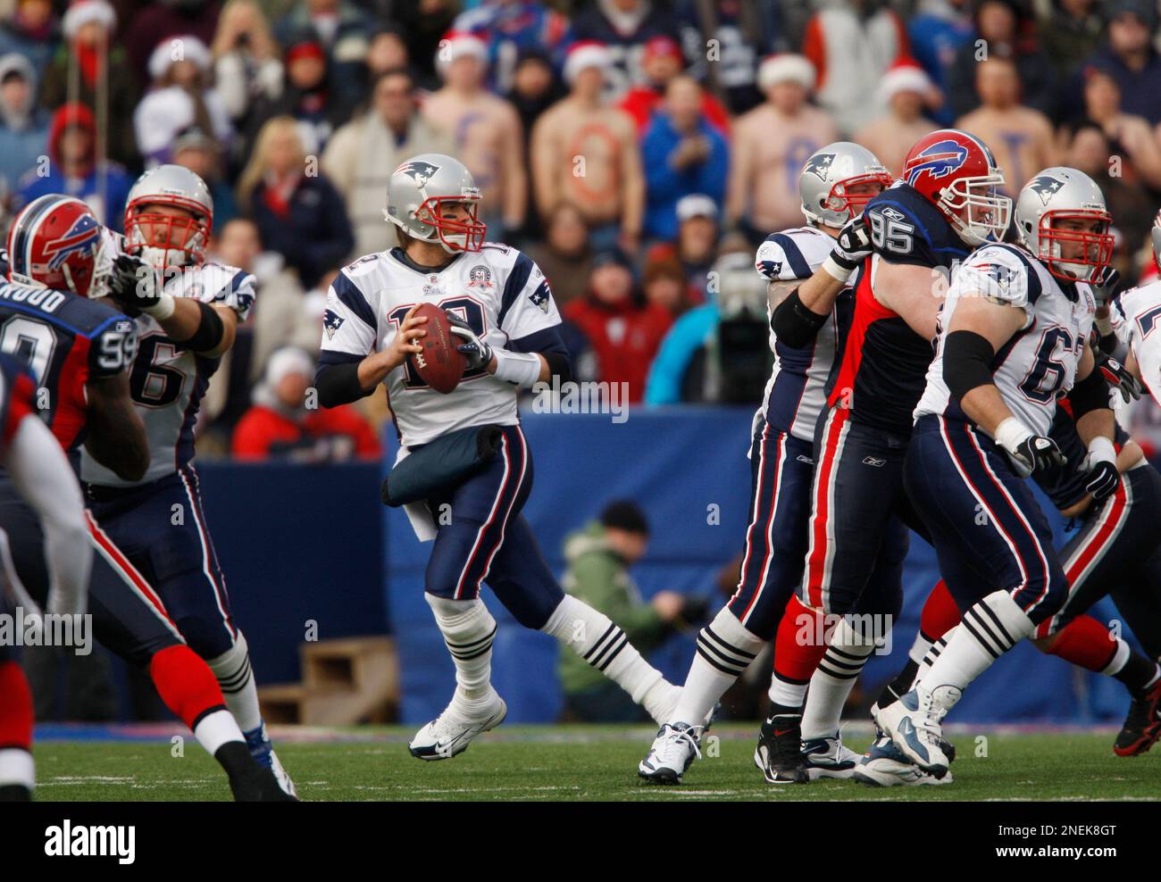 New England Patriots quarterback Tom Brady looks to pass against the ...