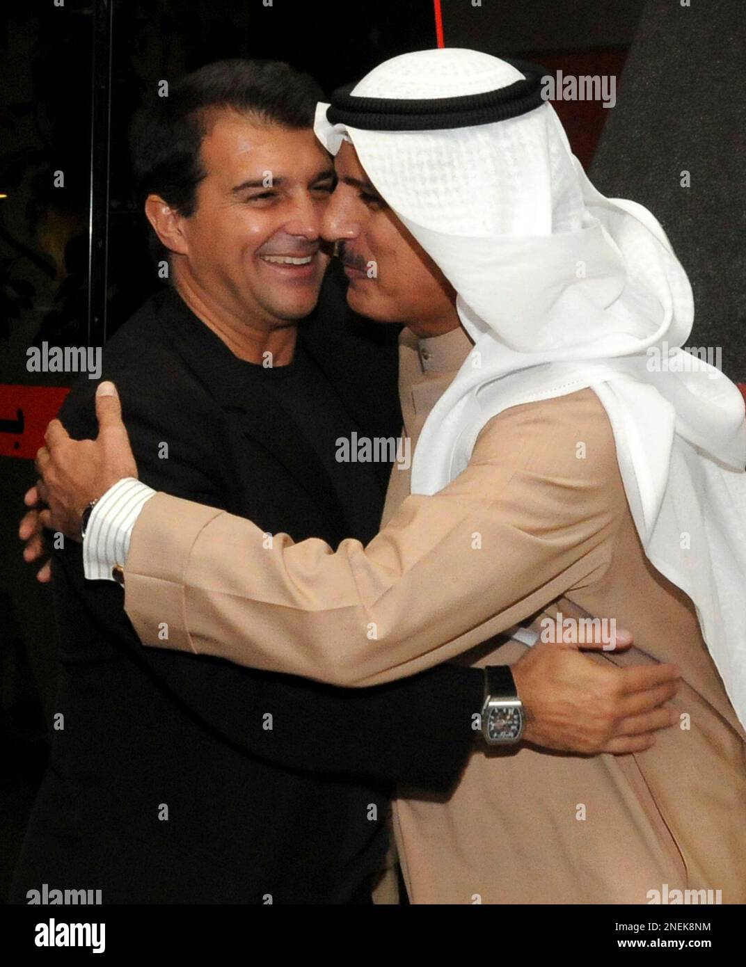 Barcelona FC president Joan Laporta, left, is received by Kuwait Kazma ...