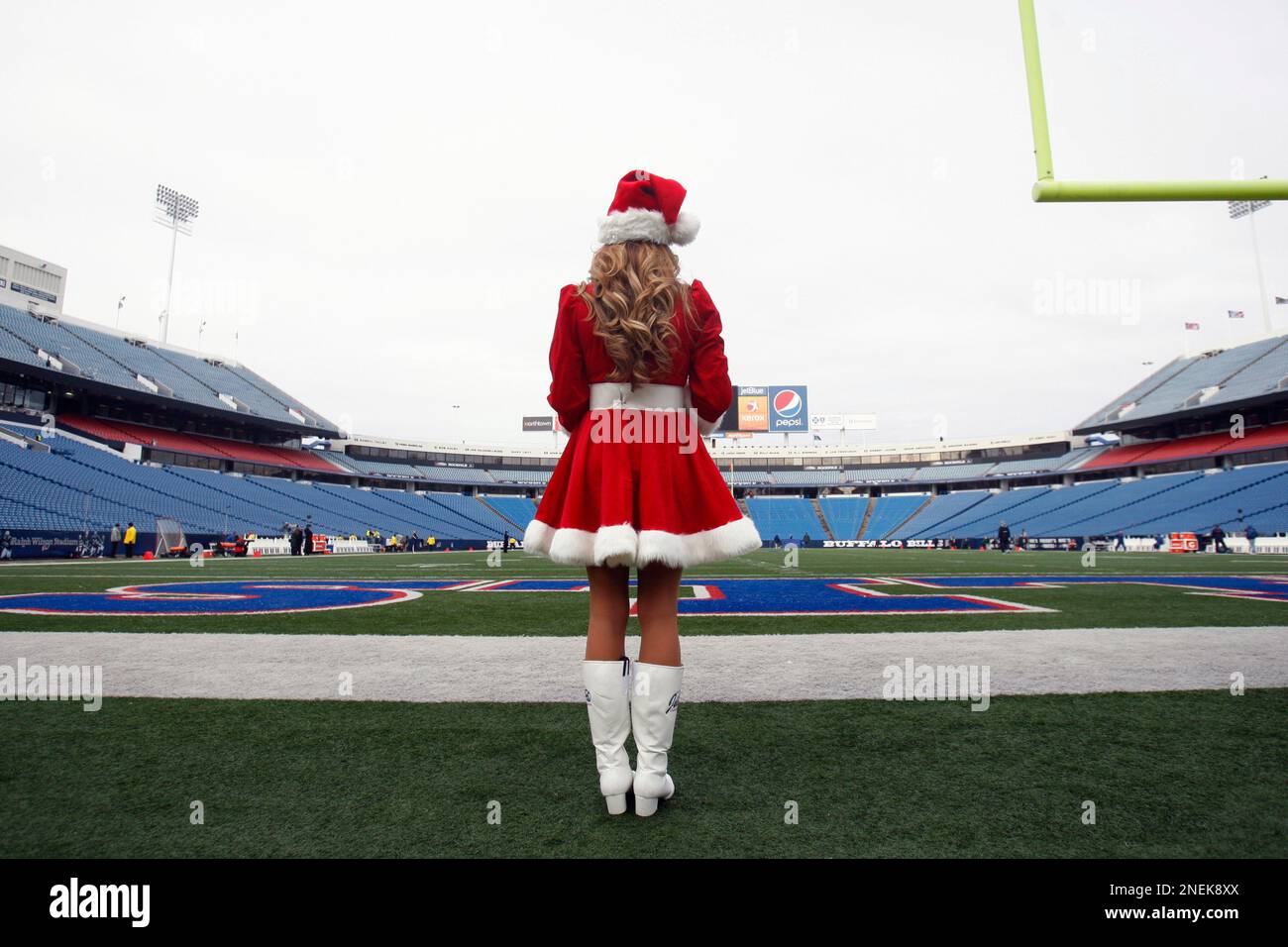 A Buffalo Bills cheerleader is seen before an NFL football game against ...
