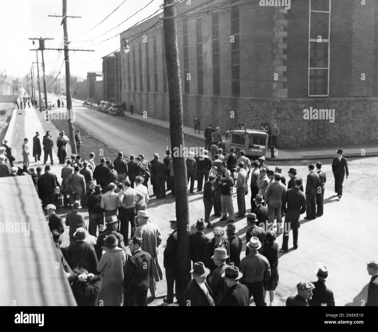 Crowd standing transportation building exterior architecture Black and ...