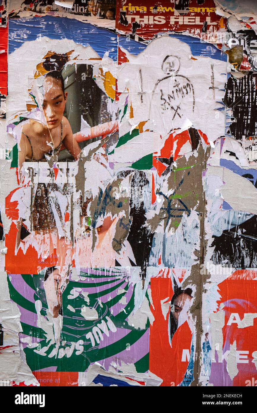 Torn and defaced posters in Soho district of London, England Stock ...