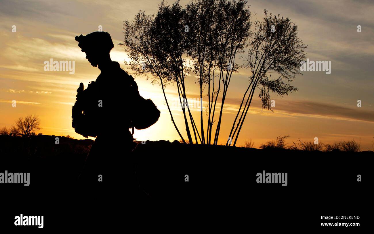 A United States Marine from the 2nd Battalion 2nd Marines "Warlords" is ...