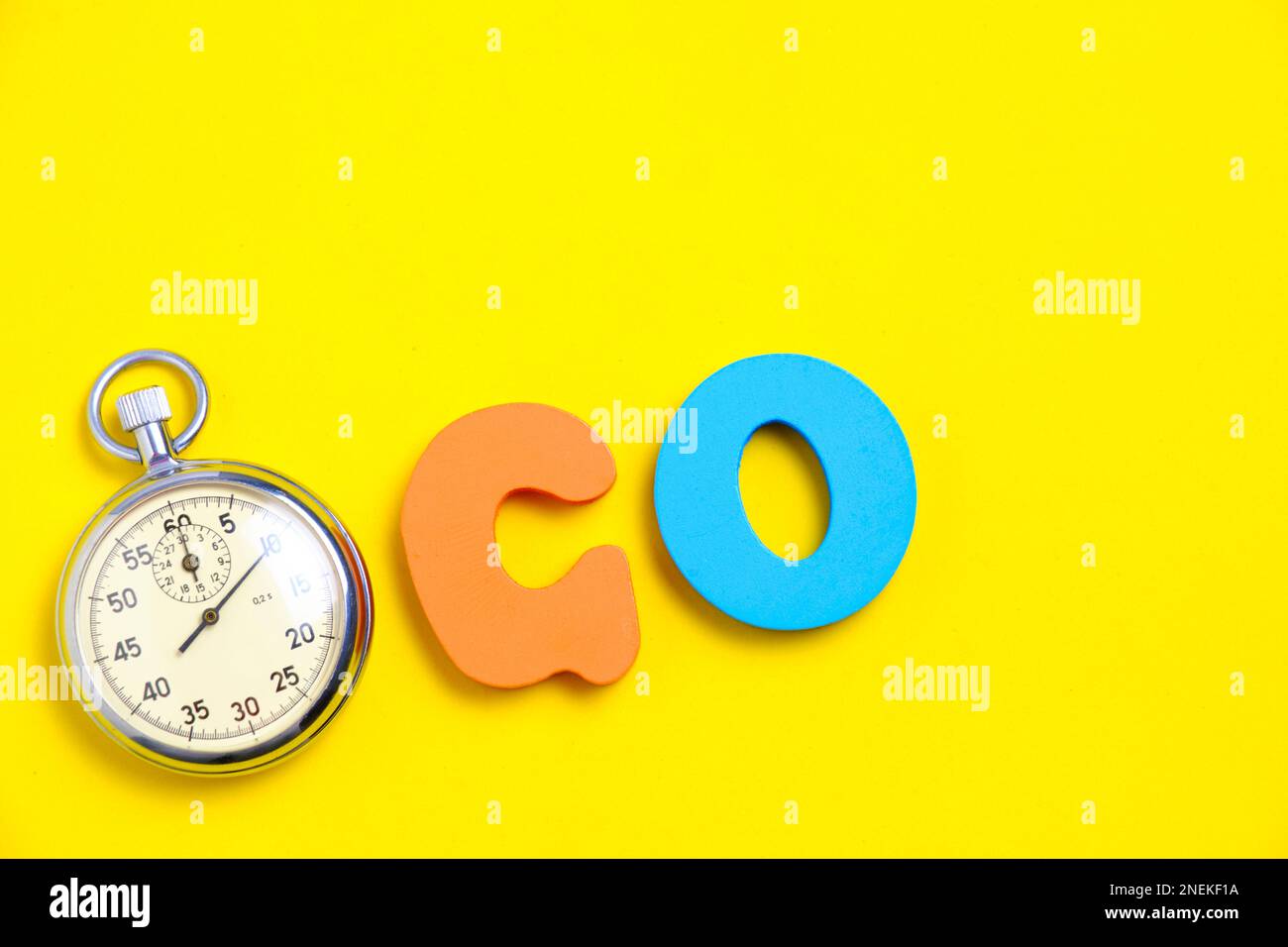 Word go and stopwatch yellow background Stock Photo - Alamy
