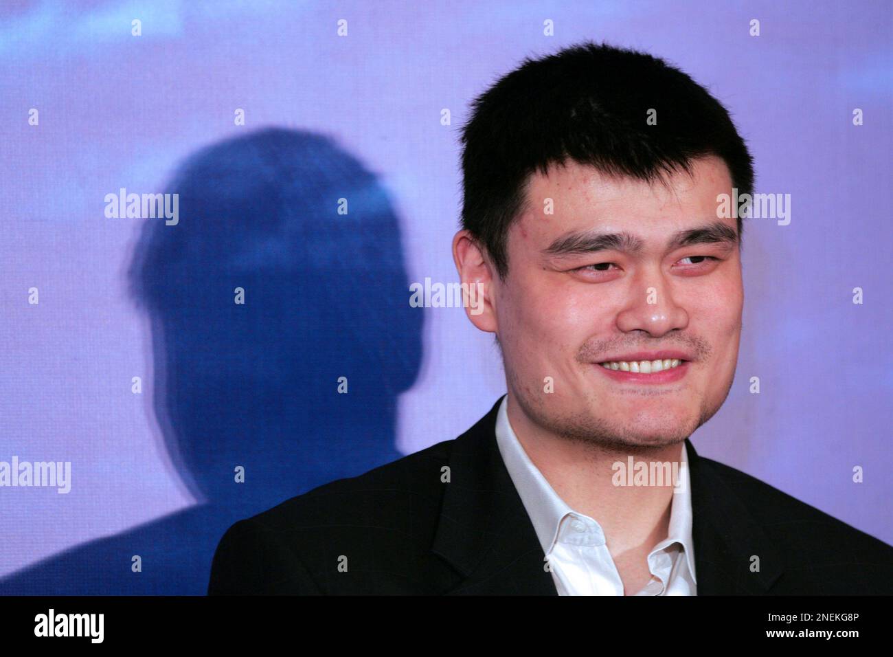 Yao Ming smiles during a ceremony for the launch of a shark ...