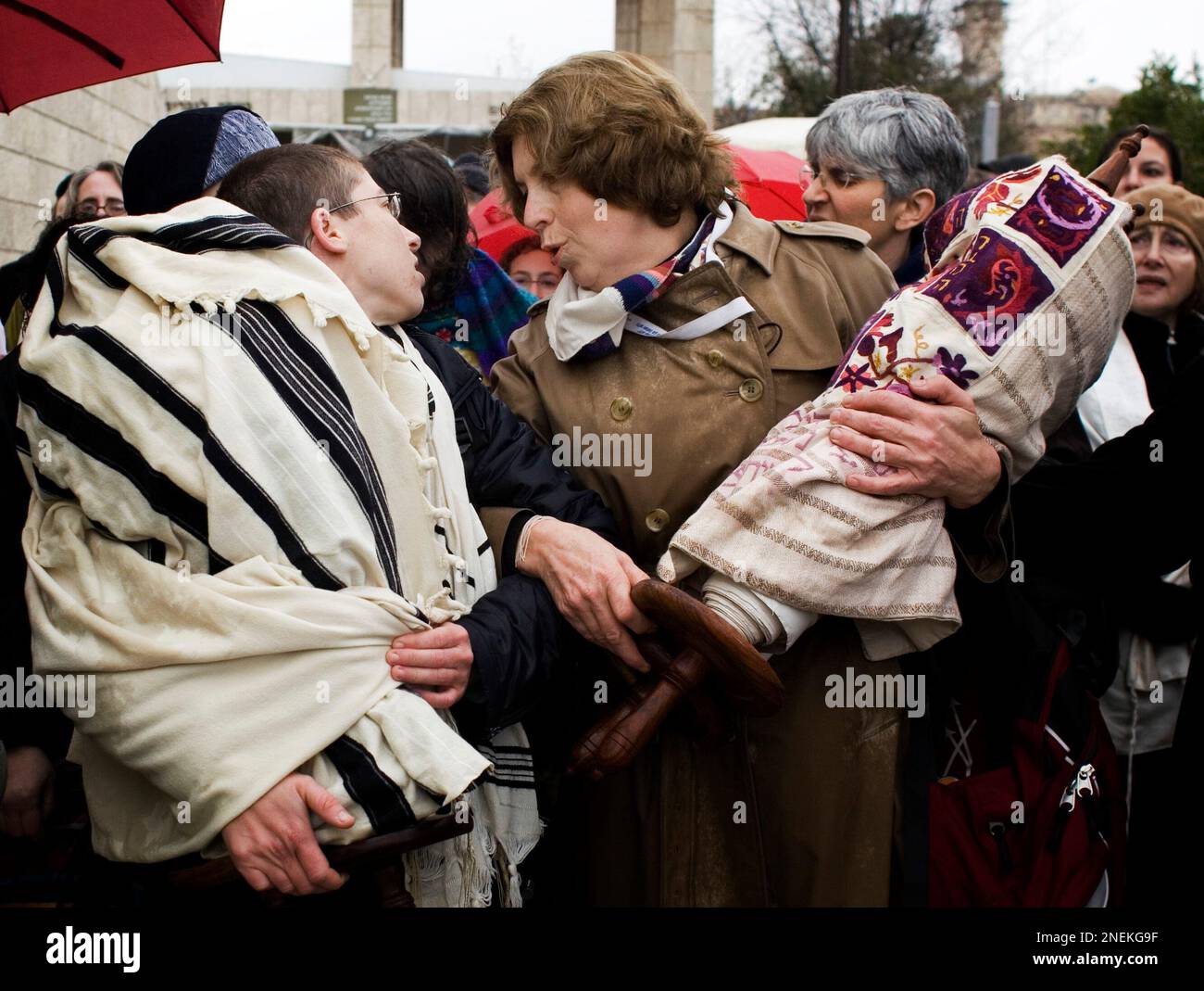 Israeli women of the Women of the Wall organization carry Torah scrolls ...