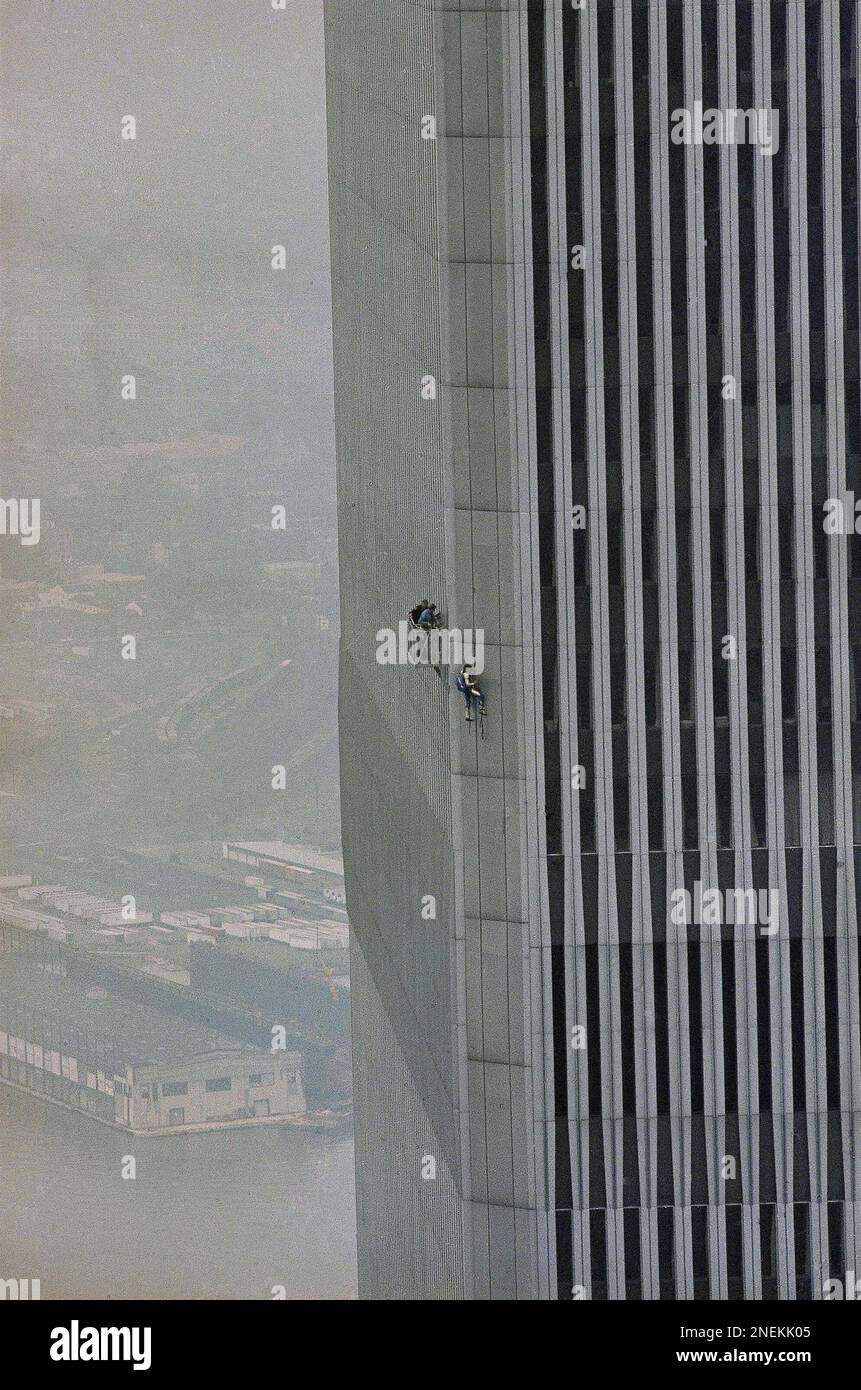 Daniel Goodwin (?Spider Man?) climbs the sheer face of the North Tower ...