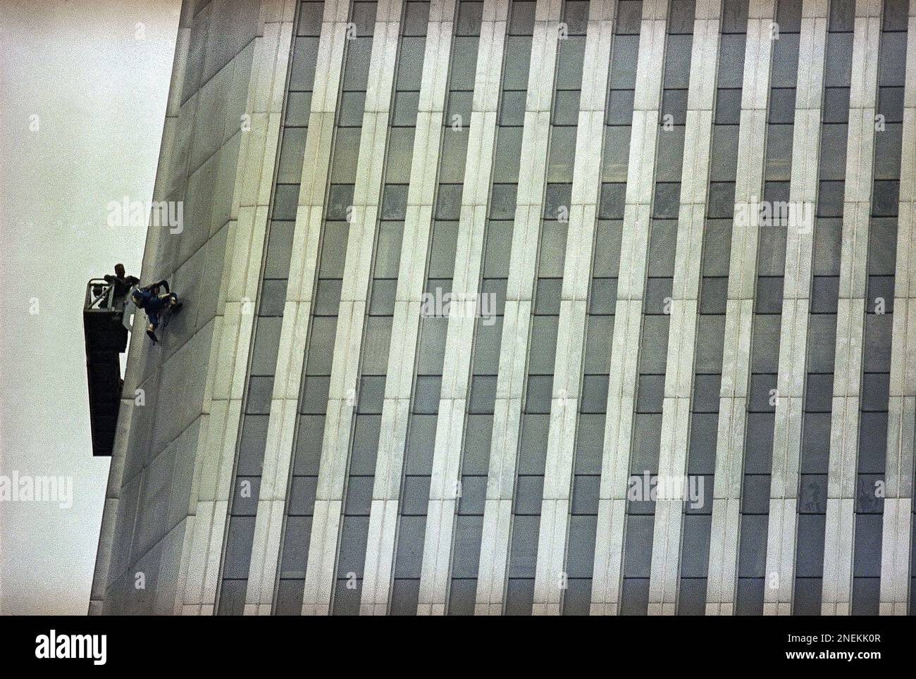Daniel Goodwin (?Spider Man?) climbs the sheer face of the North Tower ...