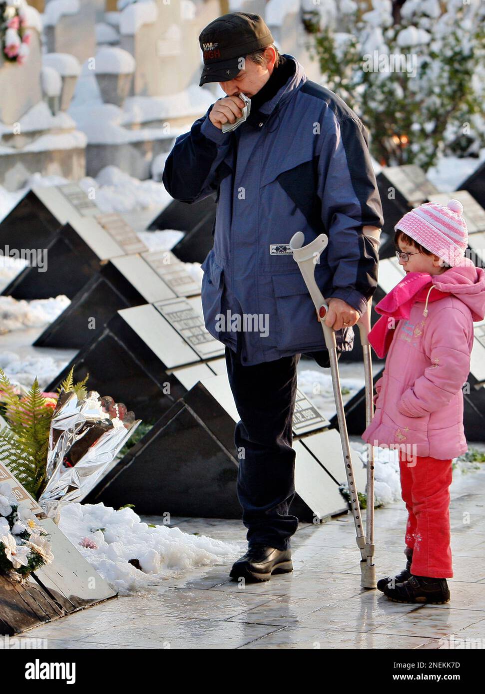 Danut Gavra, 42, left, who lost his leg in the anti-communist uprising ...